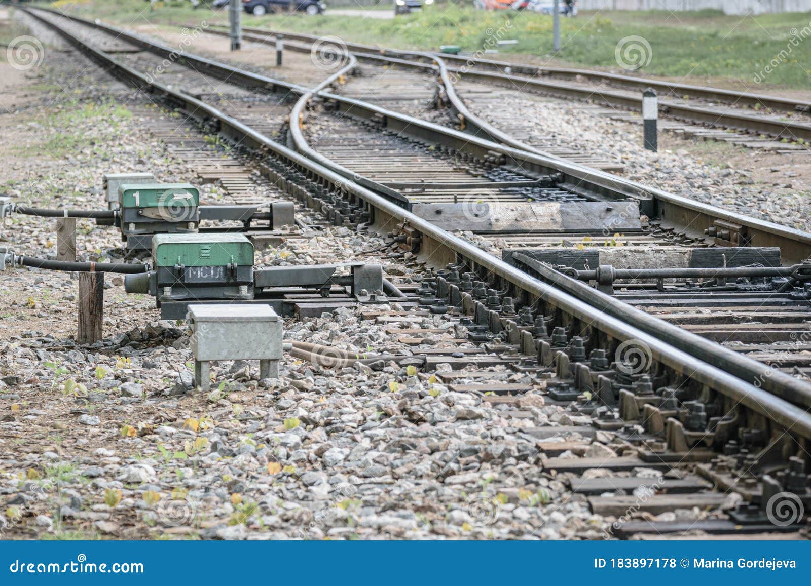 Electric Remote Rail Switch. Iron Rails on Concrete Sleepers Stock ...
