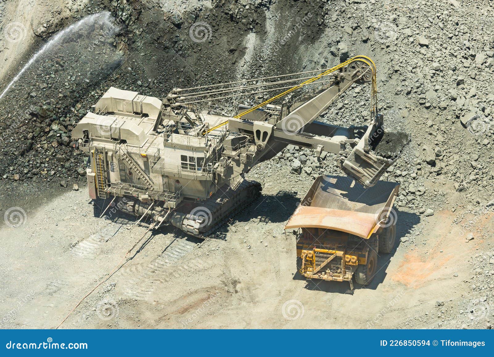 Electric Rope Shovel Loading a Dump Truck Stock Photo - Image of copper ...