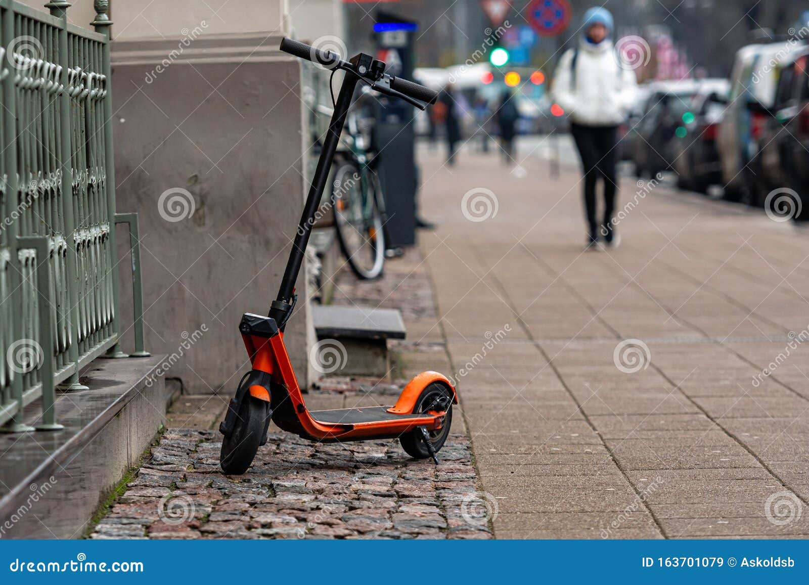 An Electric Scooter Parked on the Sidewalk in Riga, Latvia Stock Image ...