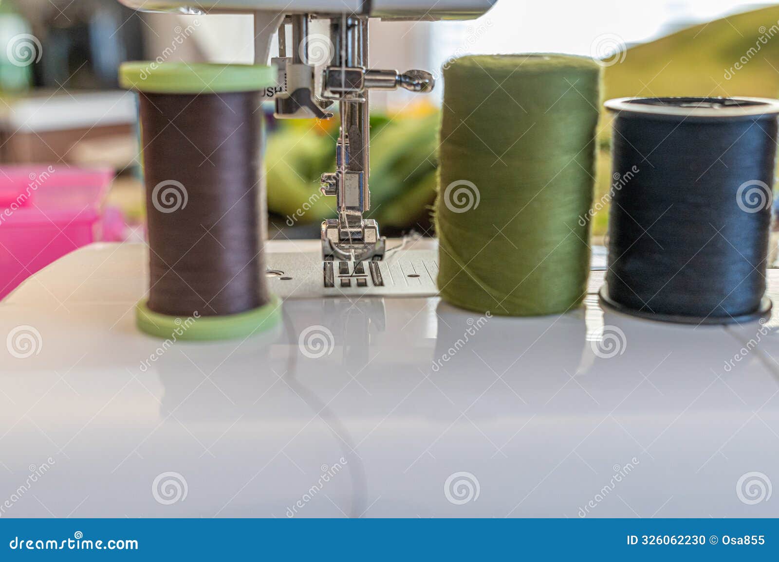 Electric Sewing Machine Needle with Spools of Thread Stock Photo ...