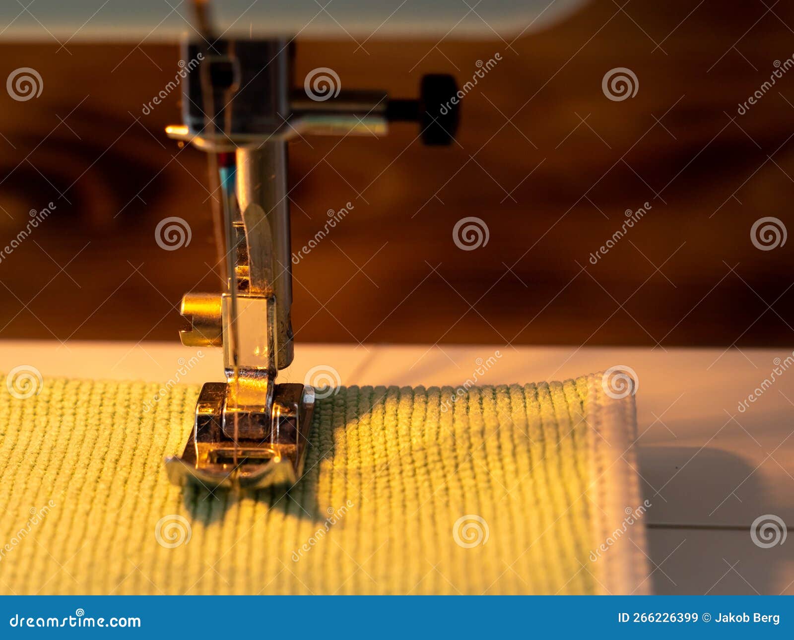 Electric Sewing Machine on a Wooden Background. Stock Image - Image of ...