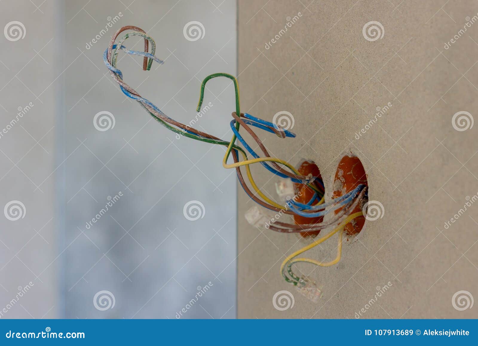 Electric Socket with Colorful Wires. in New House Interior Under ...