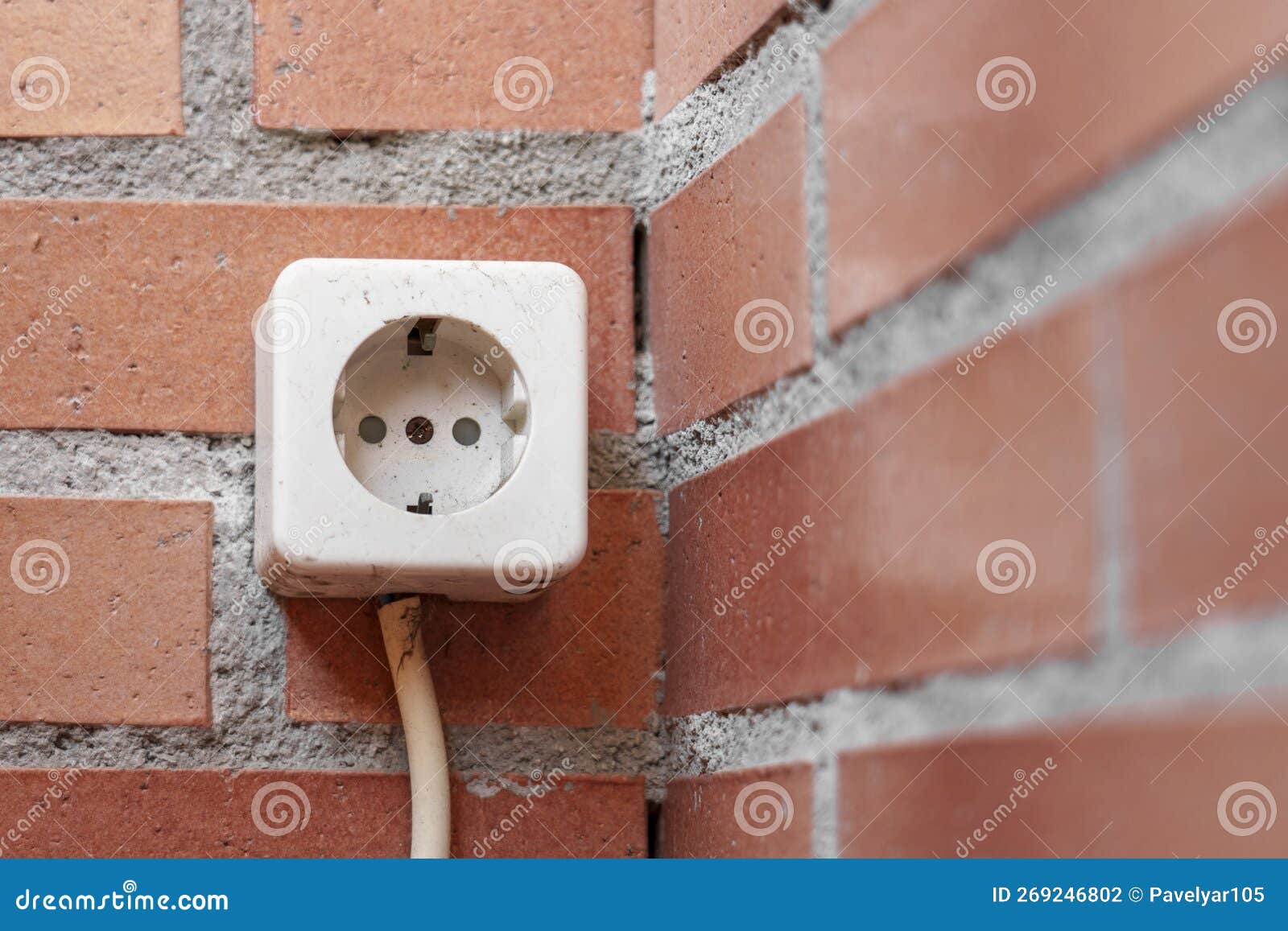 Electric Socket Outside the Garden Building on a Brick Wall Stock Photo ...