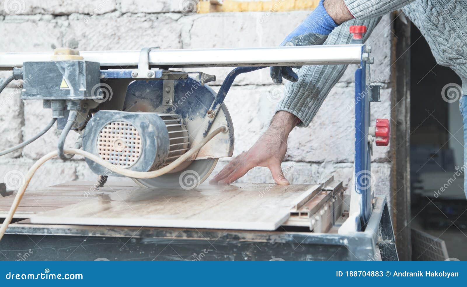 Electric Tile Cutter. Tiler Cutting Tile on Wet Saw Machine Stock Image ...