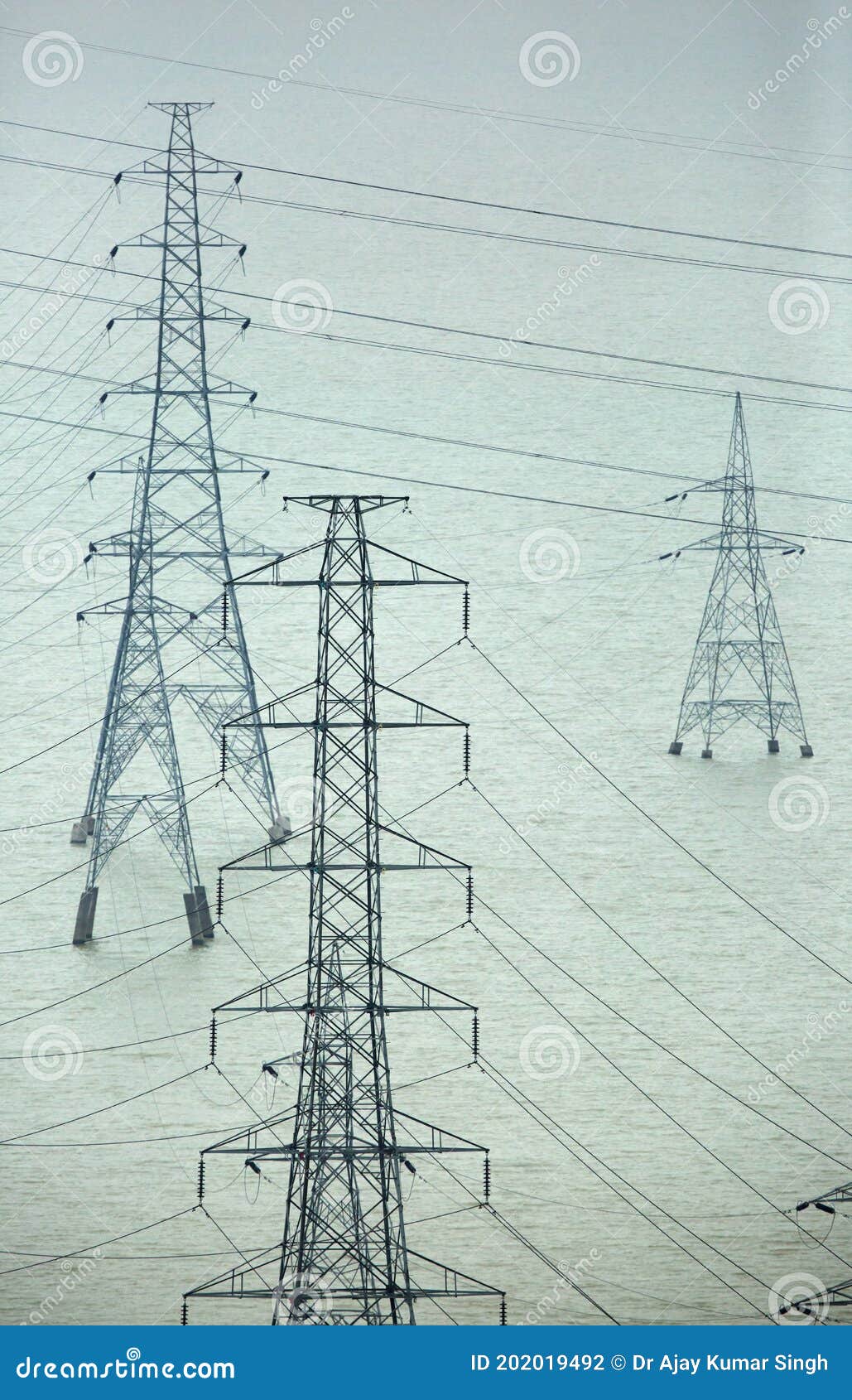 Electric Towers Passing through the Reservoir Area Stock Photo - Image ...