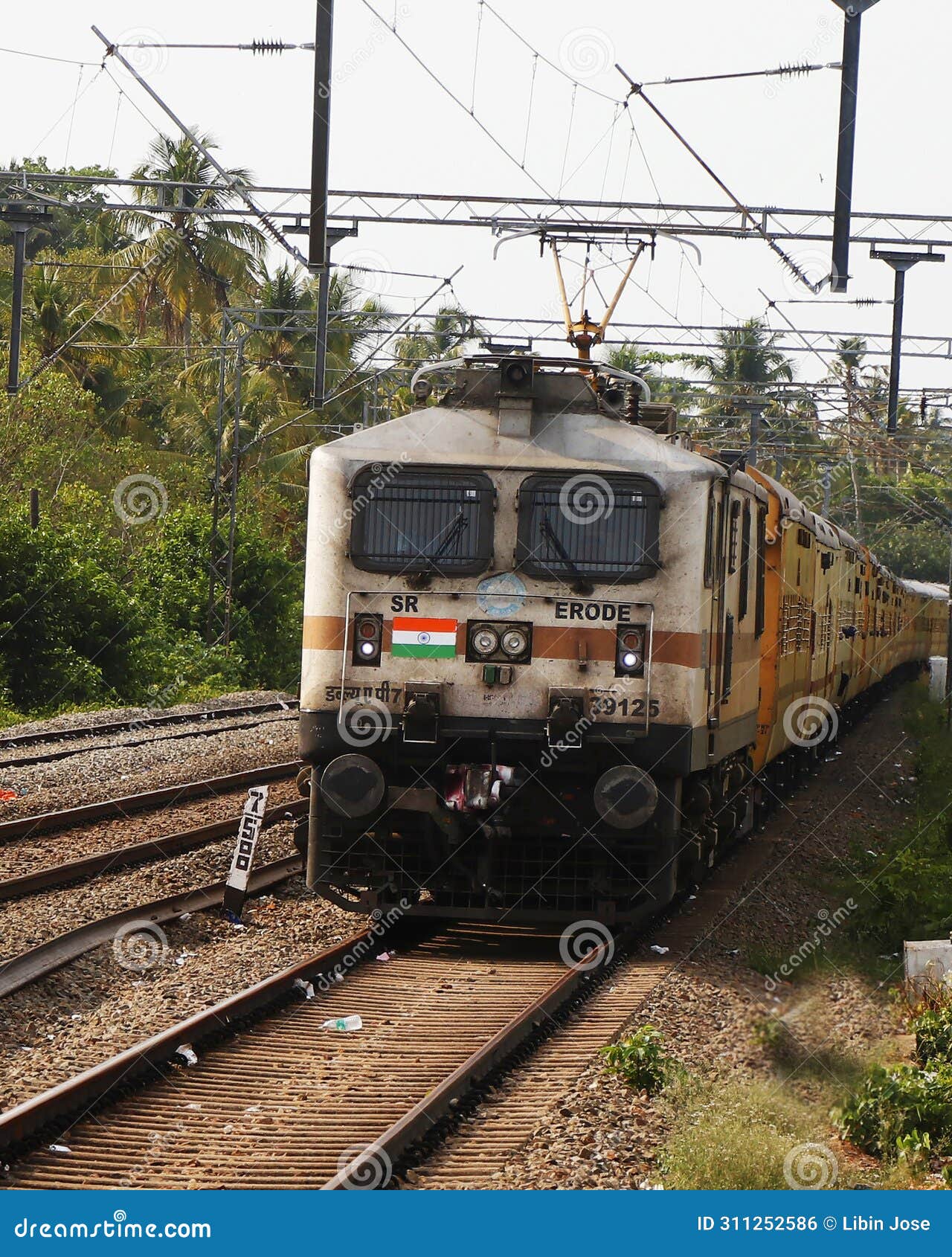 Electric Train Moving through the Indian Railway Track Editorial Photo ...