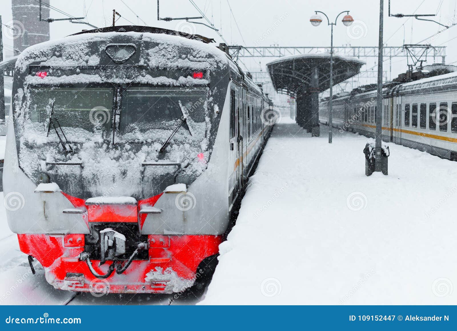 Electric Train in Snow in a Blizzard on an Empty Platform Stock Image ...