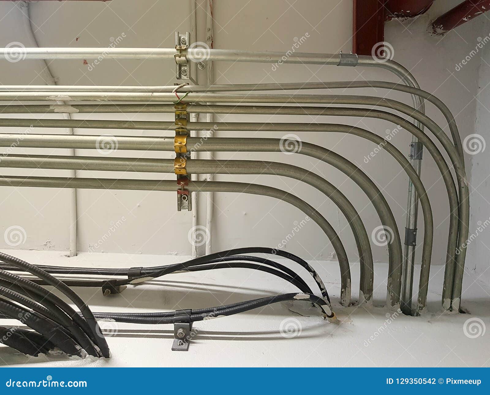 Electric Tubes and Data Cables Line Installed on Ceiling. Stock Photo ...