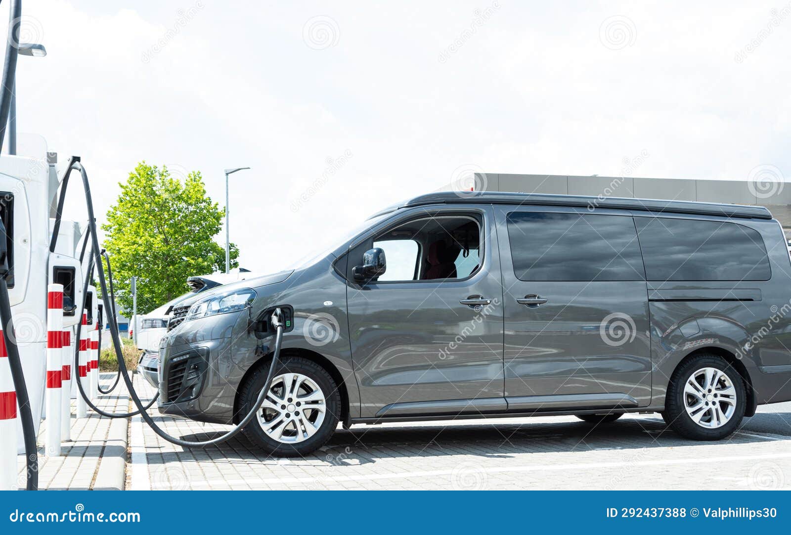 Electric Van Campervan On Charge At Public Charging Station Royalty ...
