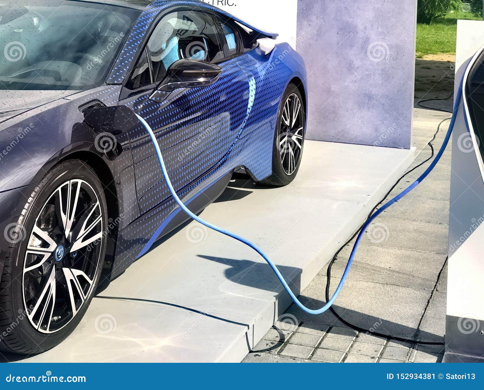 Electric Vehicle Being Plugged in Stock Image - Image of cable ...