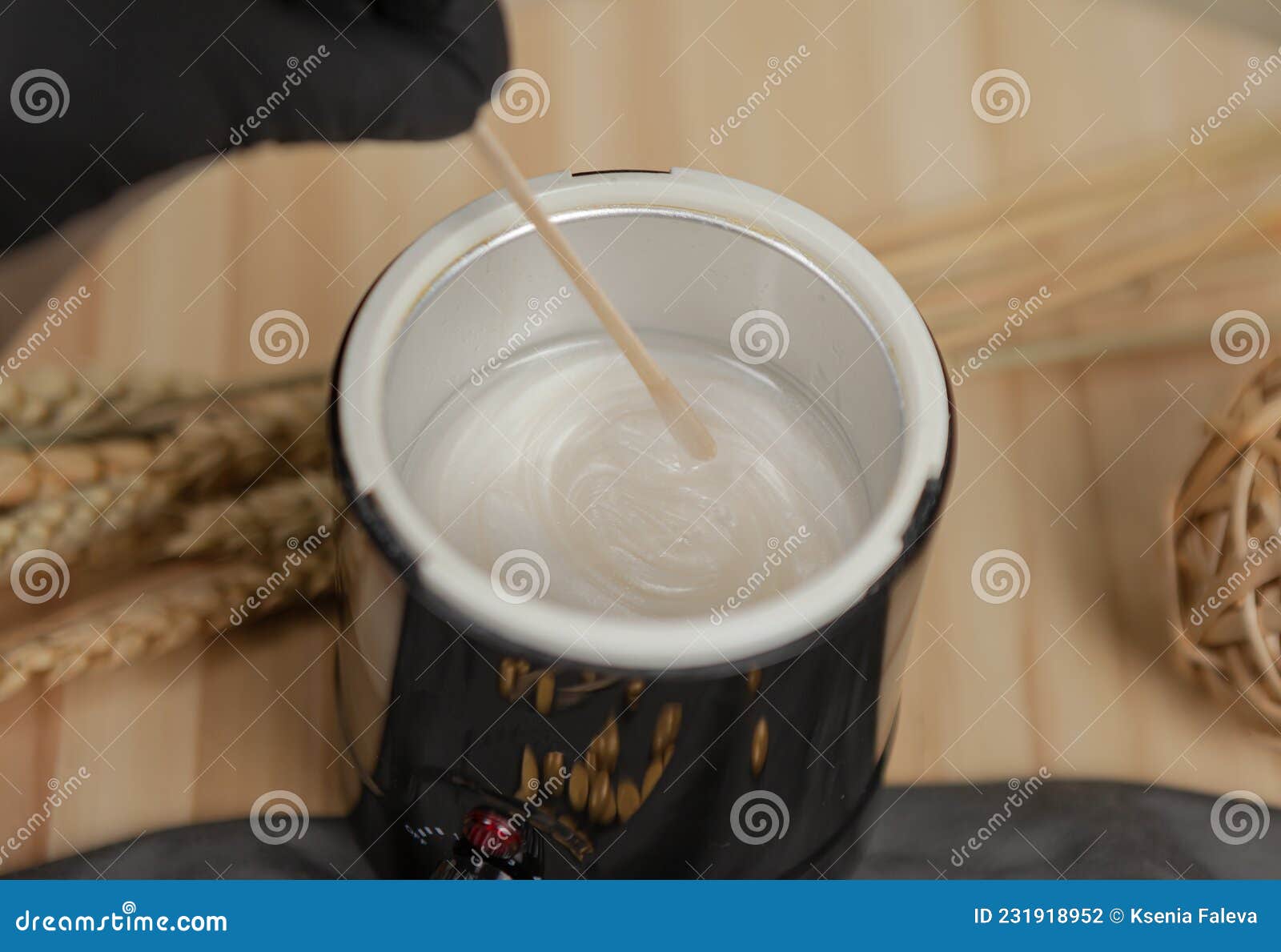 Electric Wax Warmer or Wax Heater with Melted Wax during Heating Inside ...