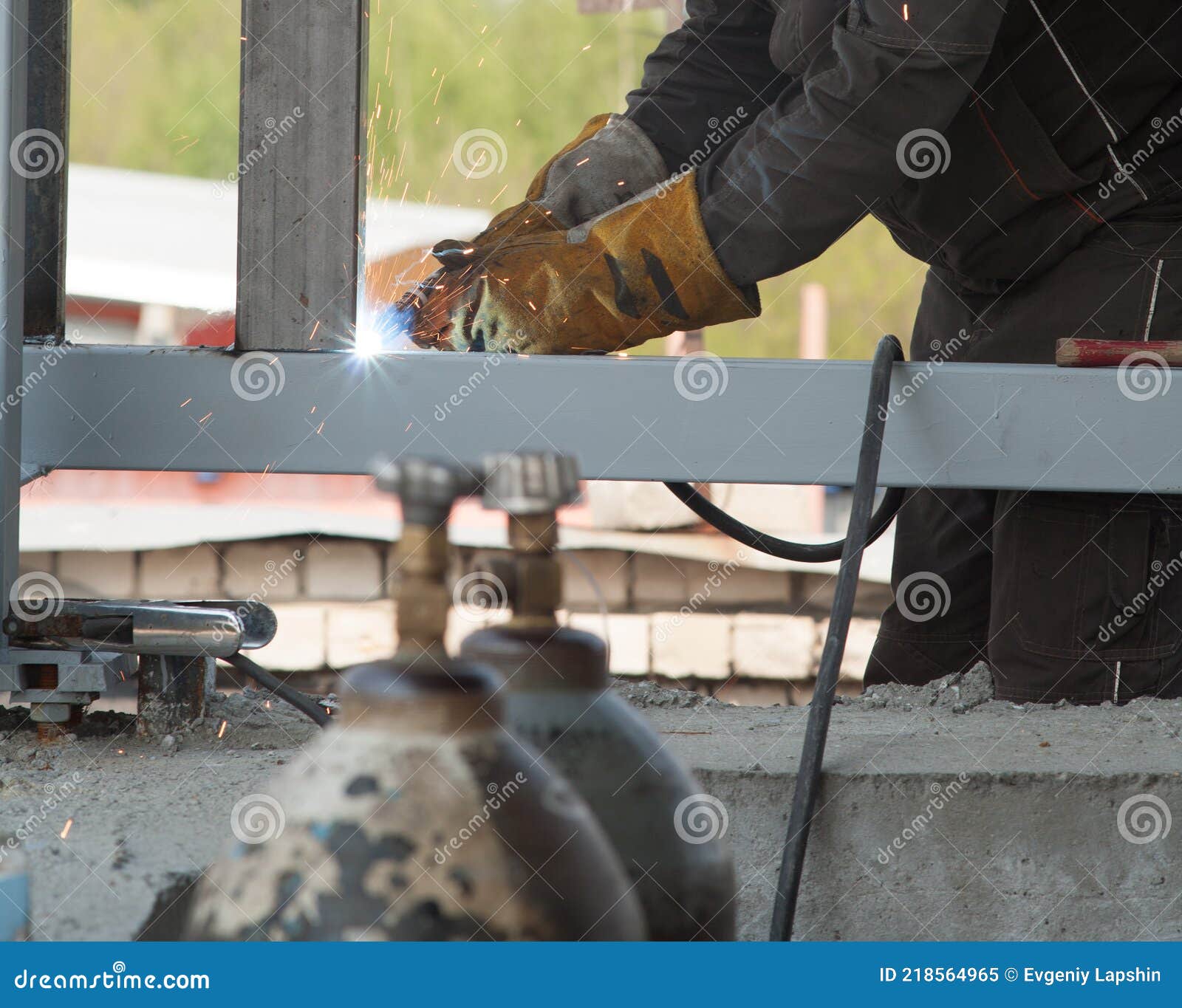 Installation Work of Electric Welding on a Clear Sunny Day at a ...