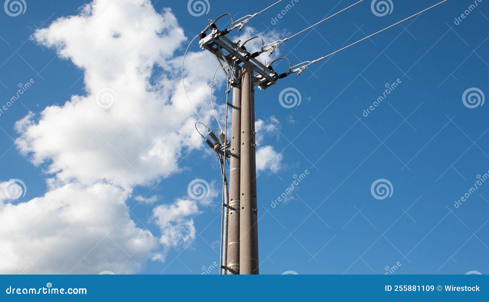 Electric Wire on a Post with a Cloudy Blue Sky Background Stock Image ...
