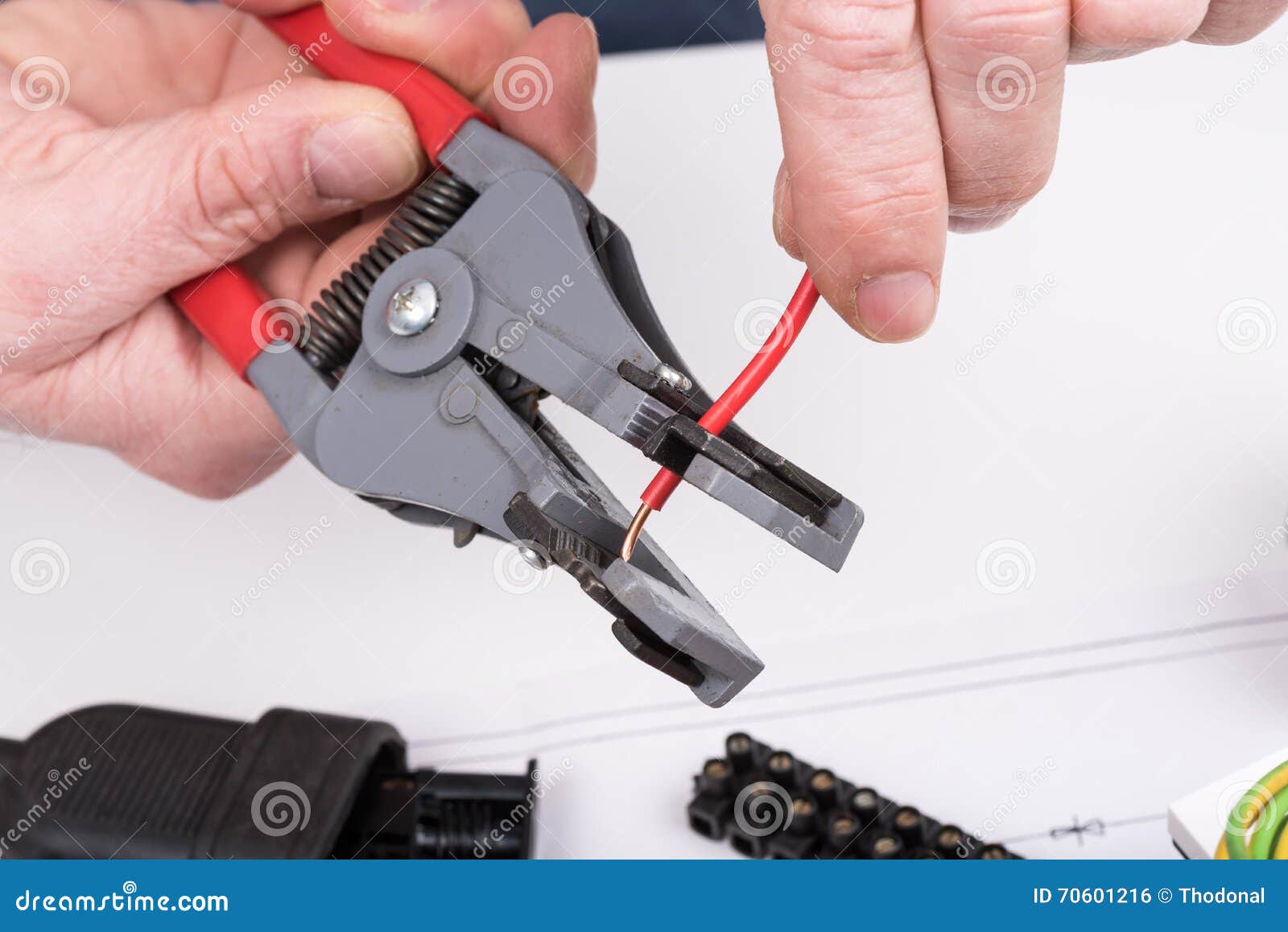 Electric wire stripping stock photo. Image of electrical - 70601216