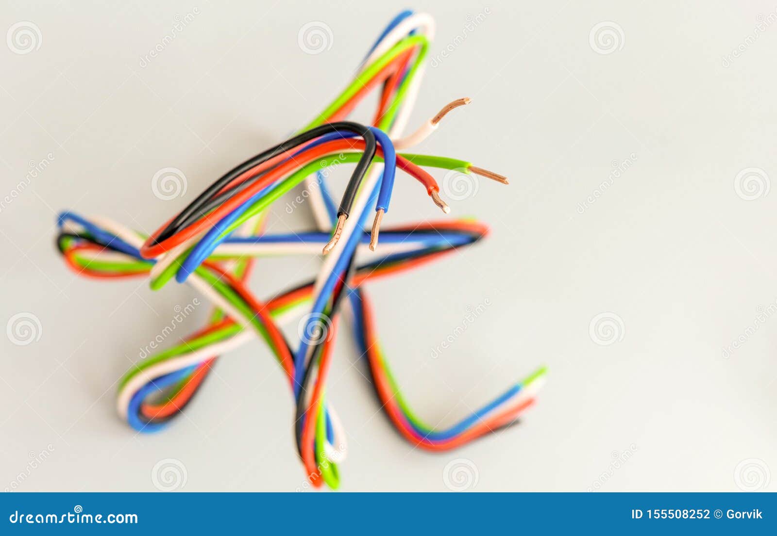Electric Wires of Different Colors in Curved Form on a Gray Background ...