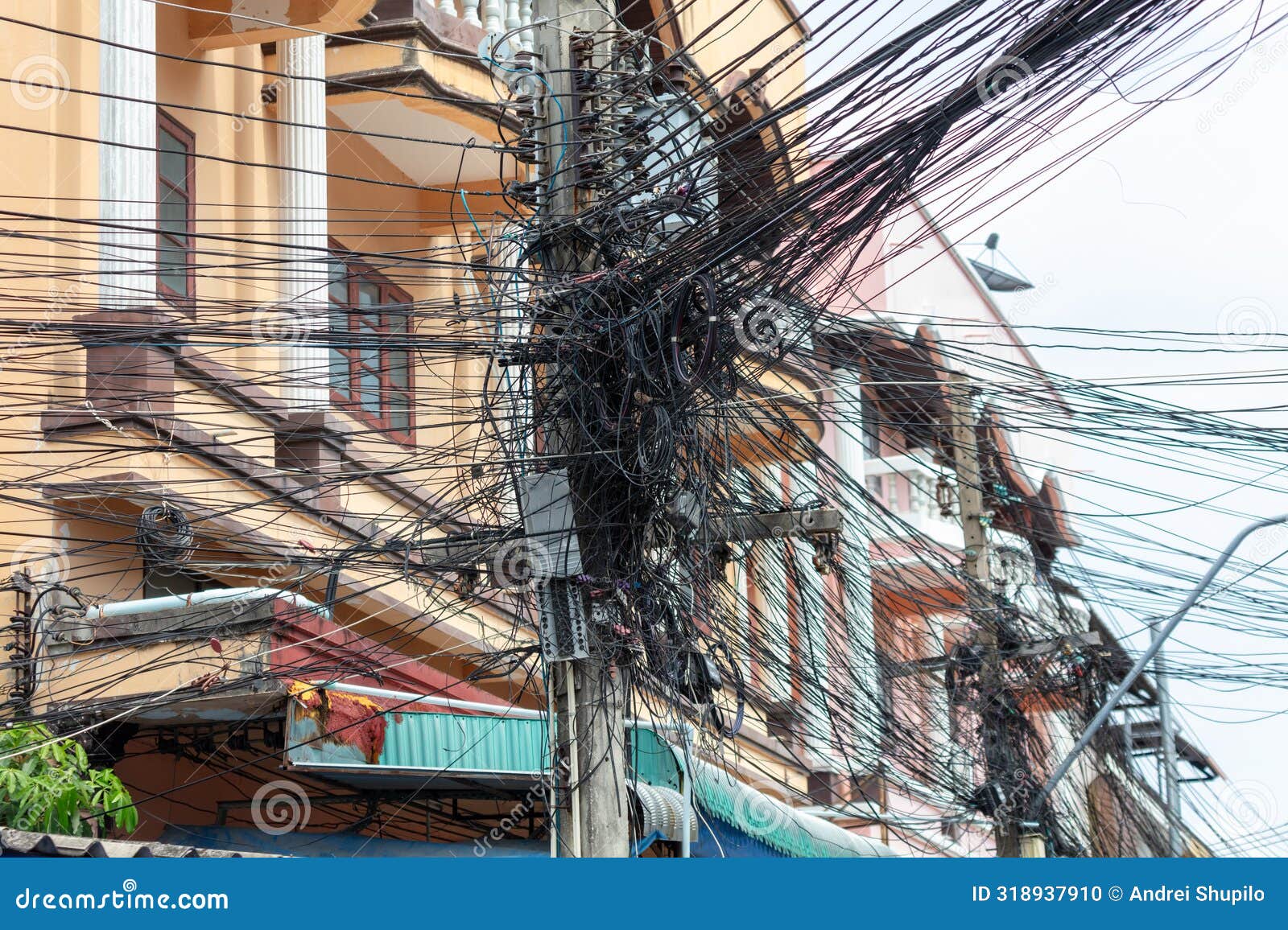 Electric Wires on Poles in the City Stock Photo - Image of tangled ...
