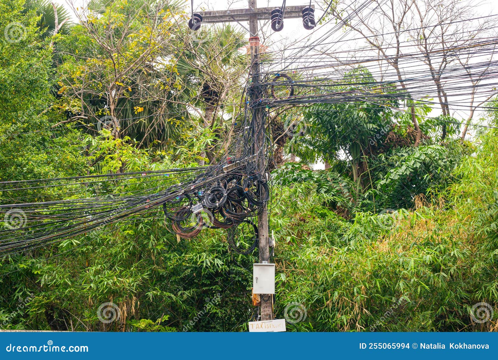 Electric Wires Wound and Hanging on a Pole in Asian Countries Stock ...