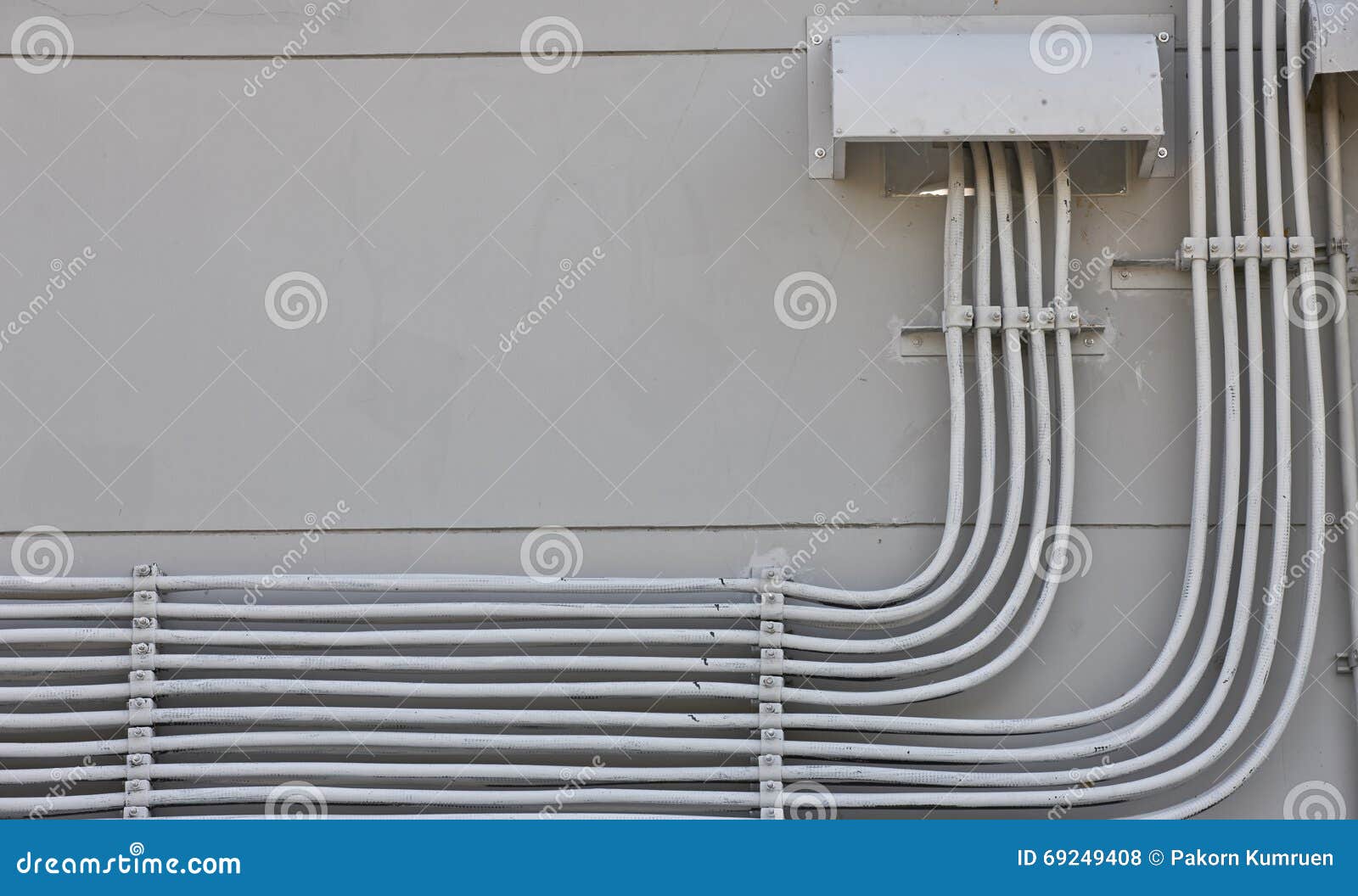 Electric Wiring Duct Of The Air Conditioner System On The Red Concrete ...
