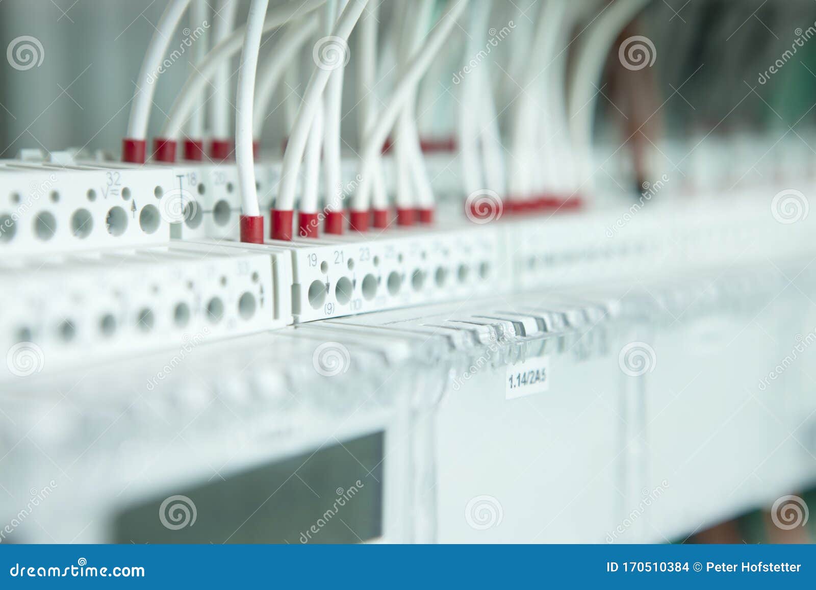 Electric Working on a Clean Modern Switchboard Stock Photo - Image of ...