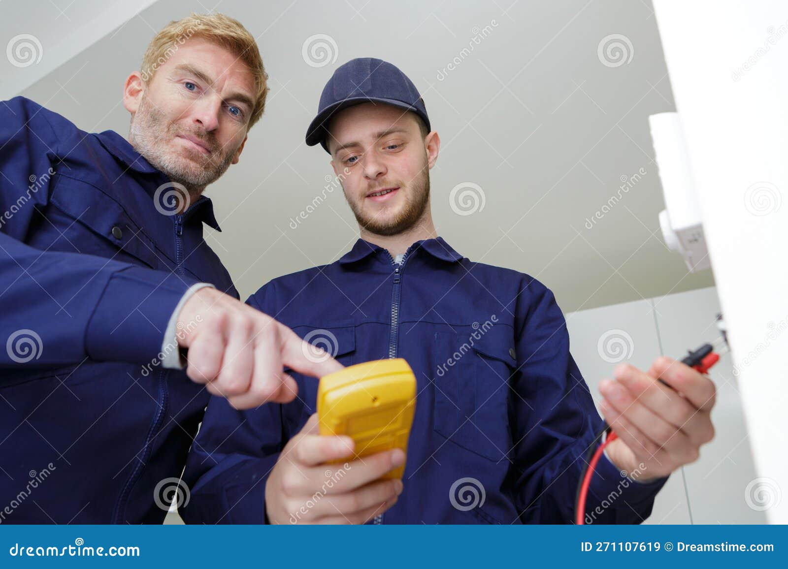 Electrical Apprentice Holding Voltmeter Stock Image - Image of ...