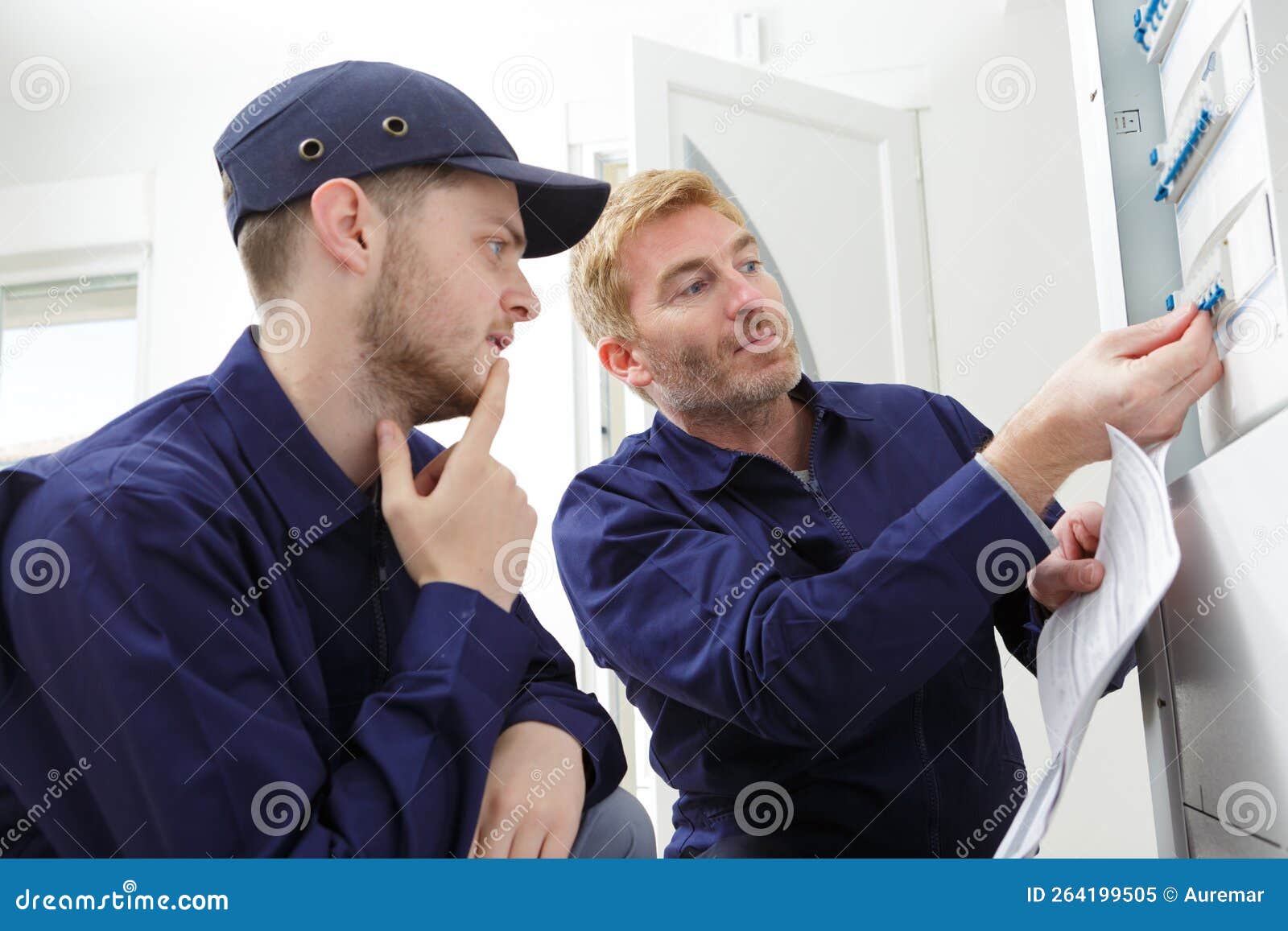 Electrical Apprentice Observing Teacher Switch Panel Stock Image ...
