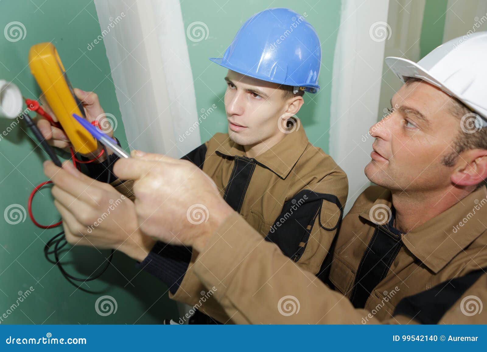 Electrical Apprentice and Teacher Stock Photo - Image of supervisor ...