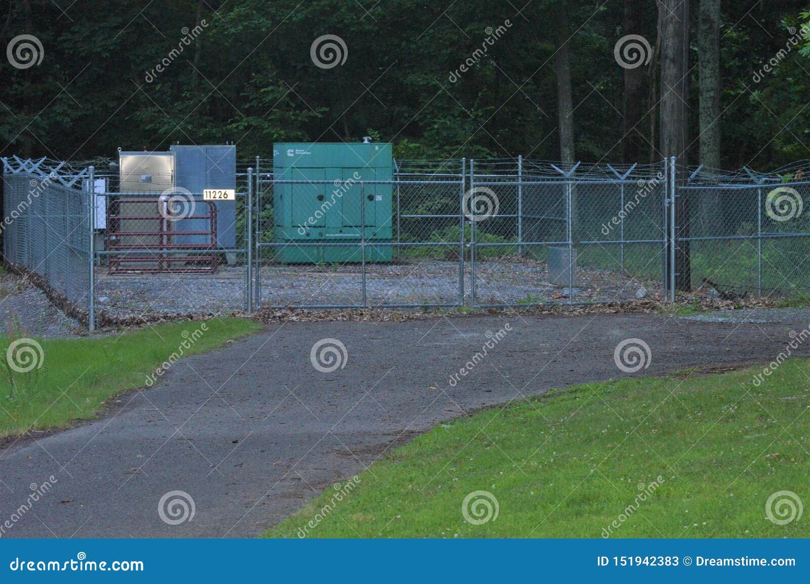 Electrical Boxes Inside of a Chain Link Fence Stock Image - Image of ...