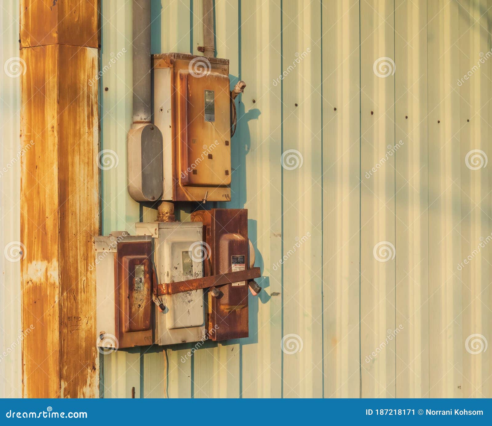 The Electrical Circuit Box That Is Old And Rusty Was Installed Next To ...