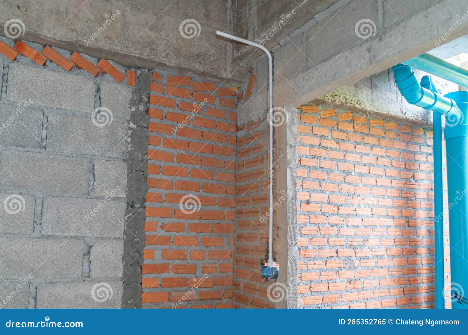 Electrical Conduit, and Wires are Installed in a House Wall Getting ...