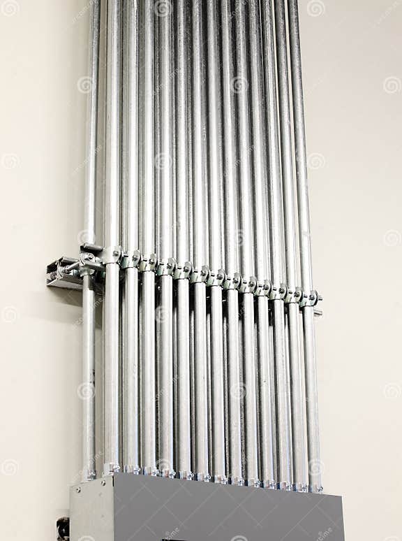 Parallel Rows of Electrical Conduits from a Distribution Panel. Stock ...