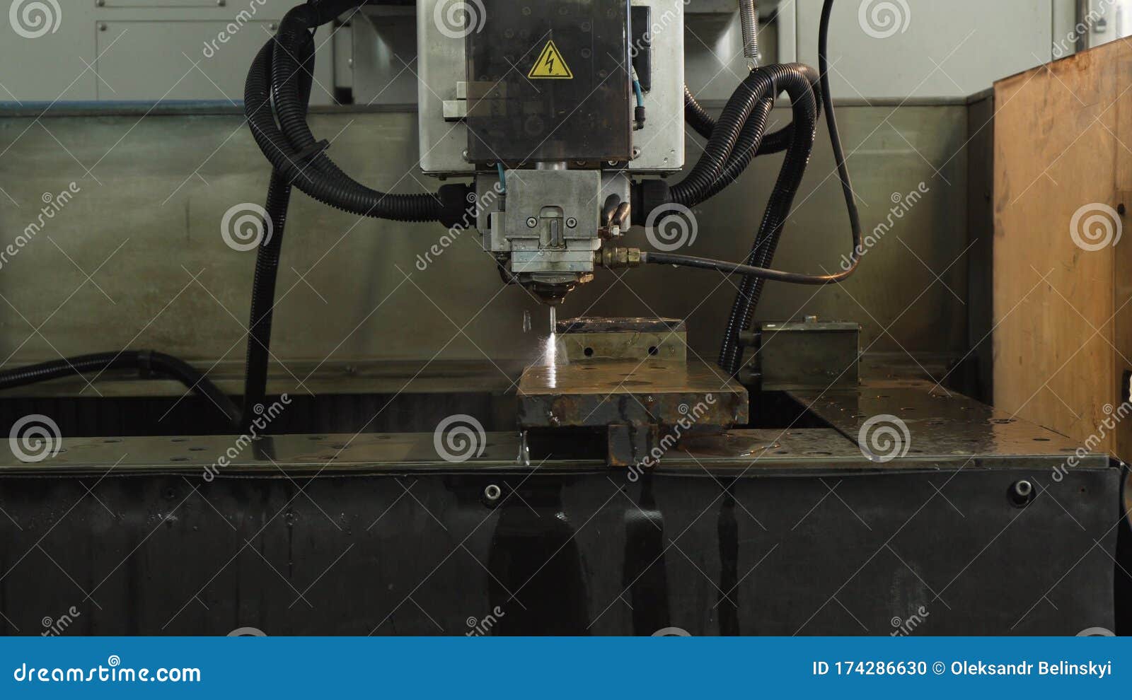 Electrical Discharge Machine Manufacturing Process Shapes Metal by ...
