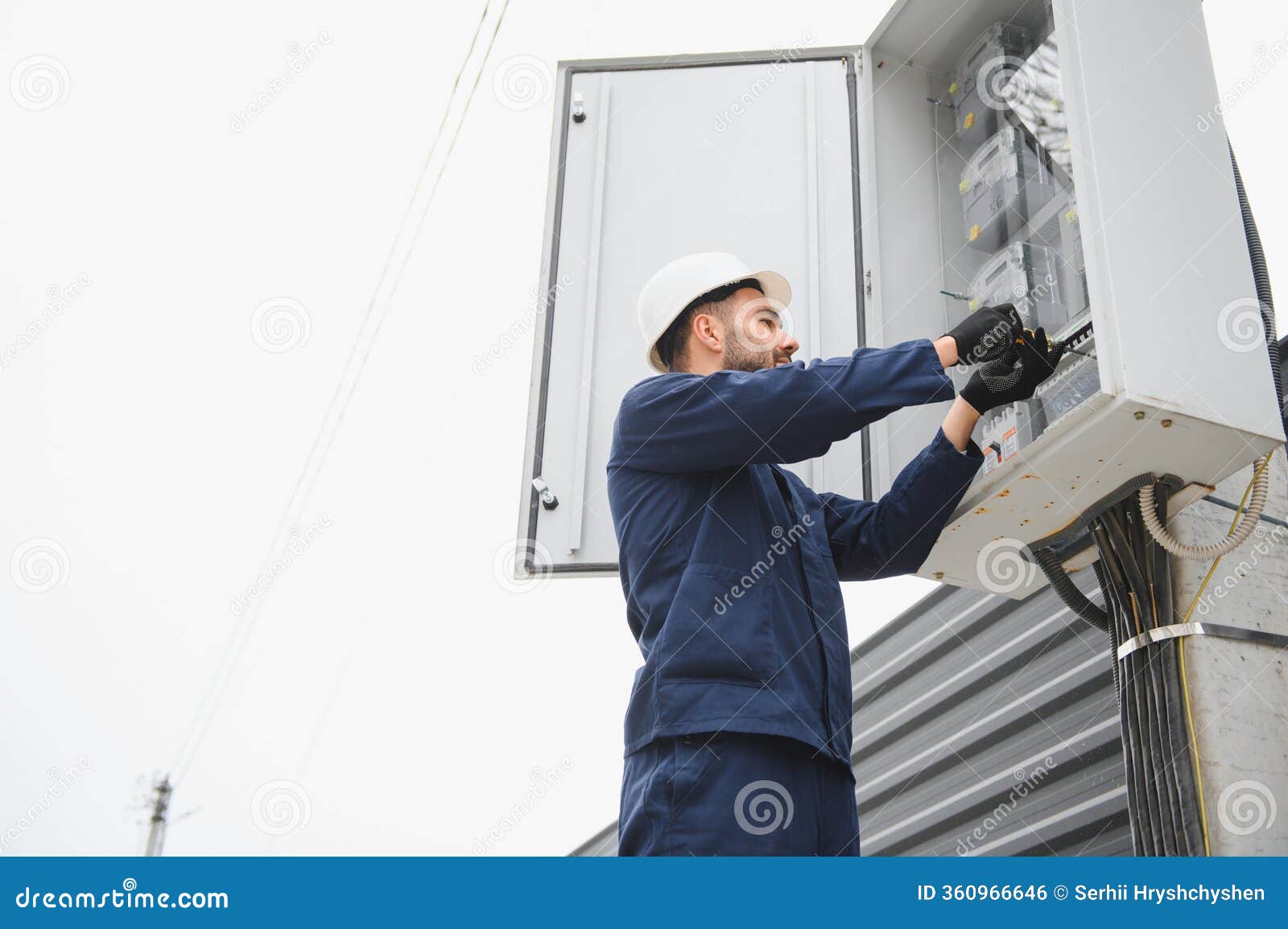 Electrical Engineer Approving Power Distribution Box Installation on ...