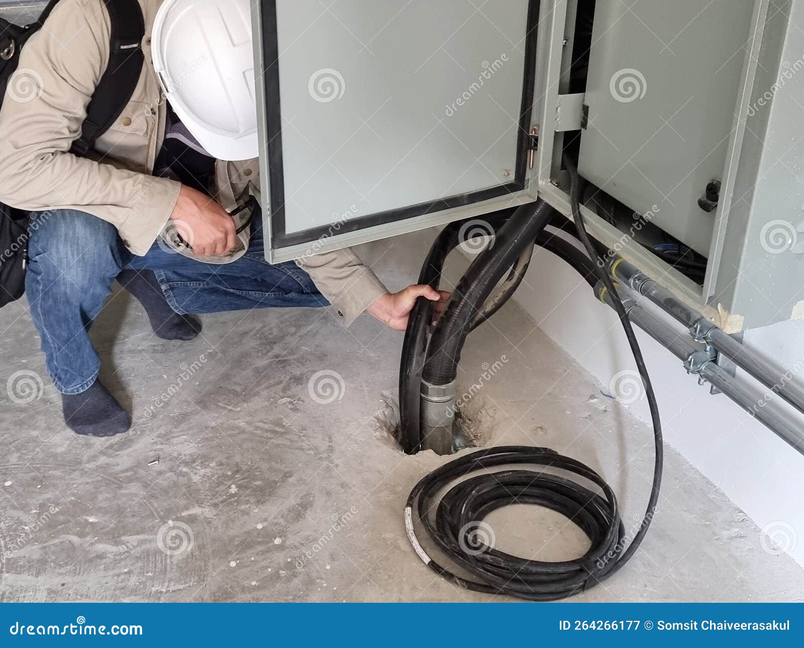 The Electrical Engineer Checking the Cable Pulling Work Stock Image ...
