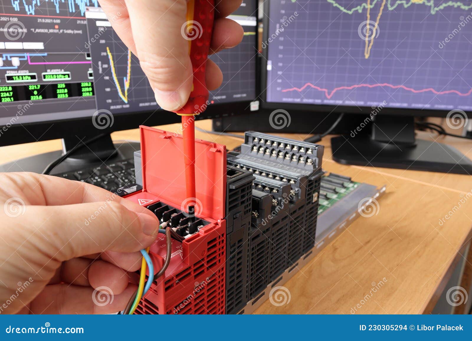The Engineer Connects The Optical Wire To The Central Router. The ...