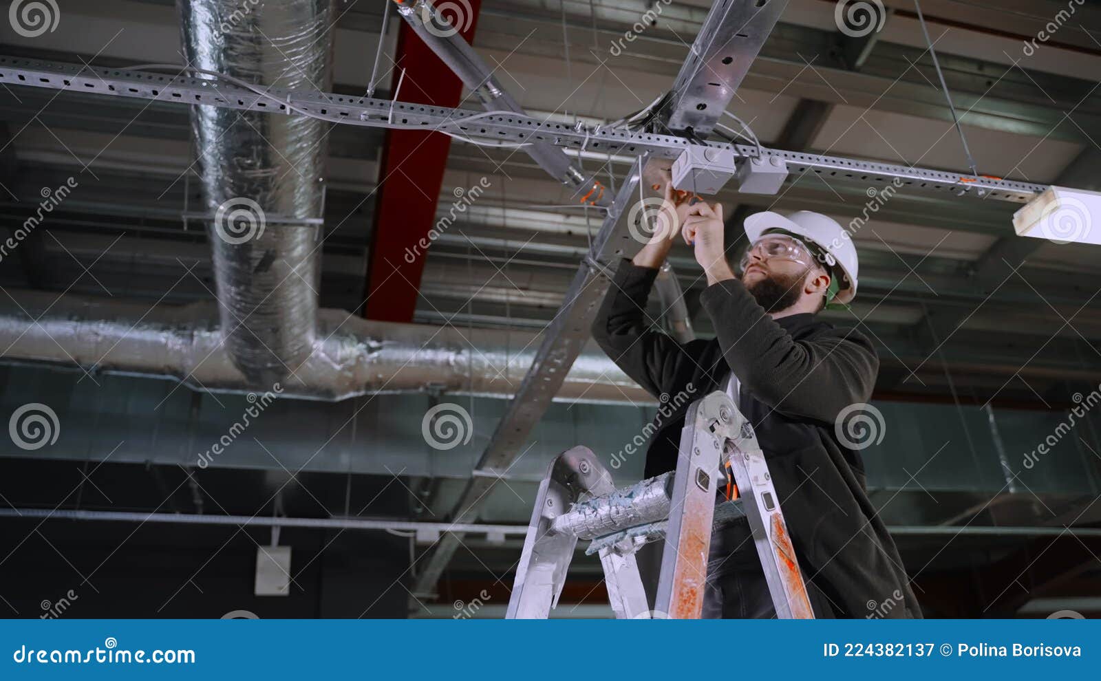 Electrician Installing Wiring in Industrial Premises Stock Video ...