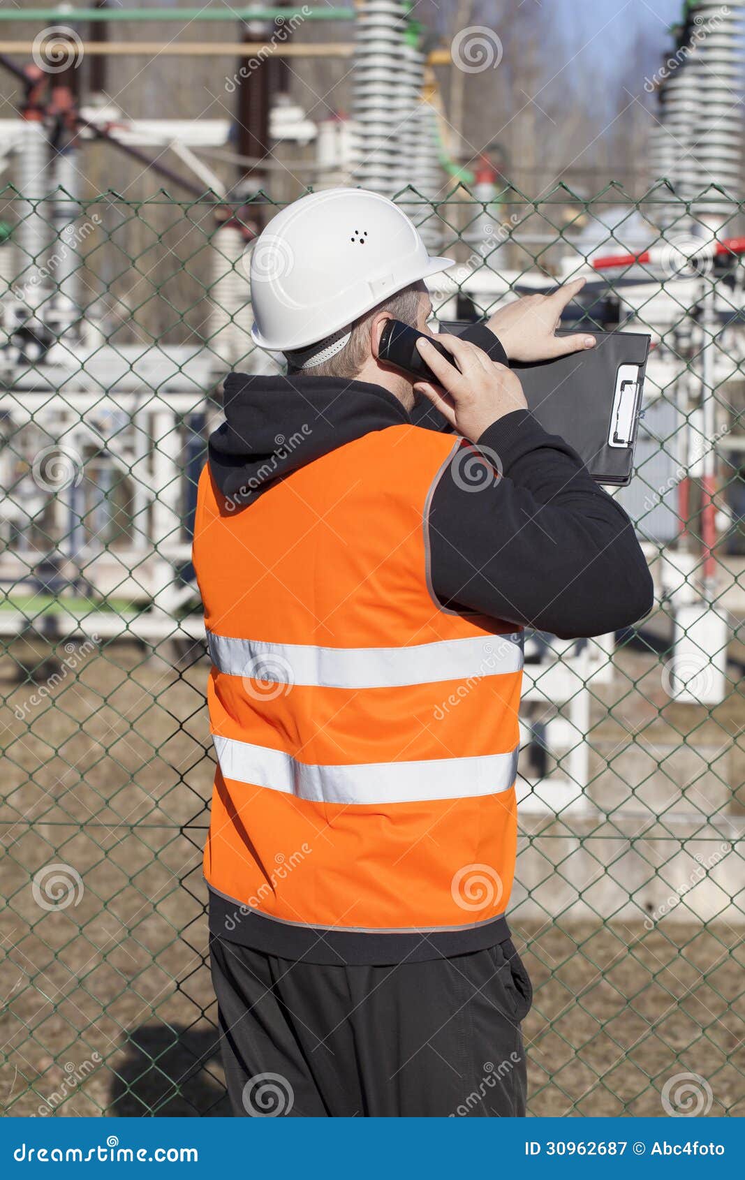 Electrical Engineer Talking on the Cell Phone Stock Image - Image of ...