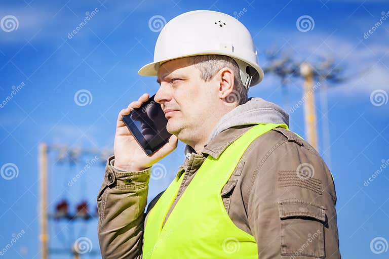 Electrical Engineer Talking on Cell Phone at Outdoors Stock Photo ...