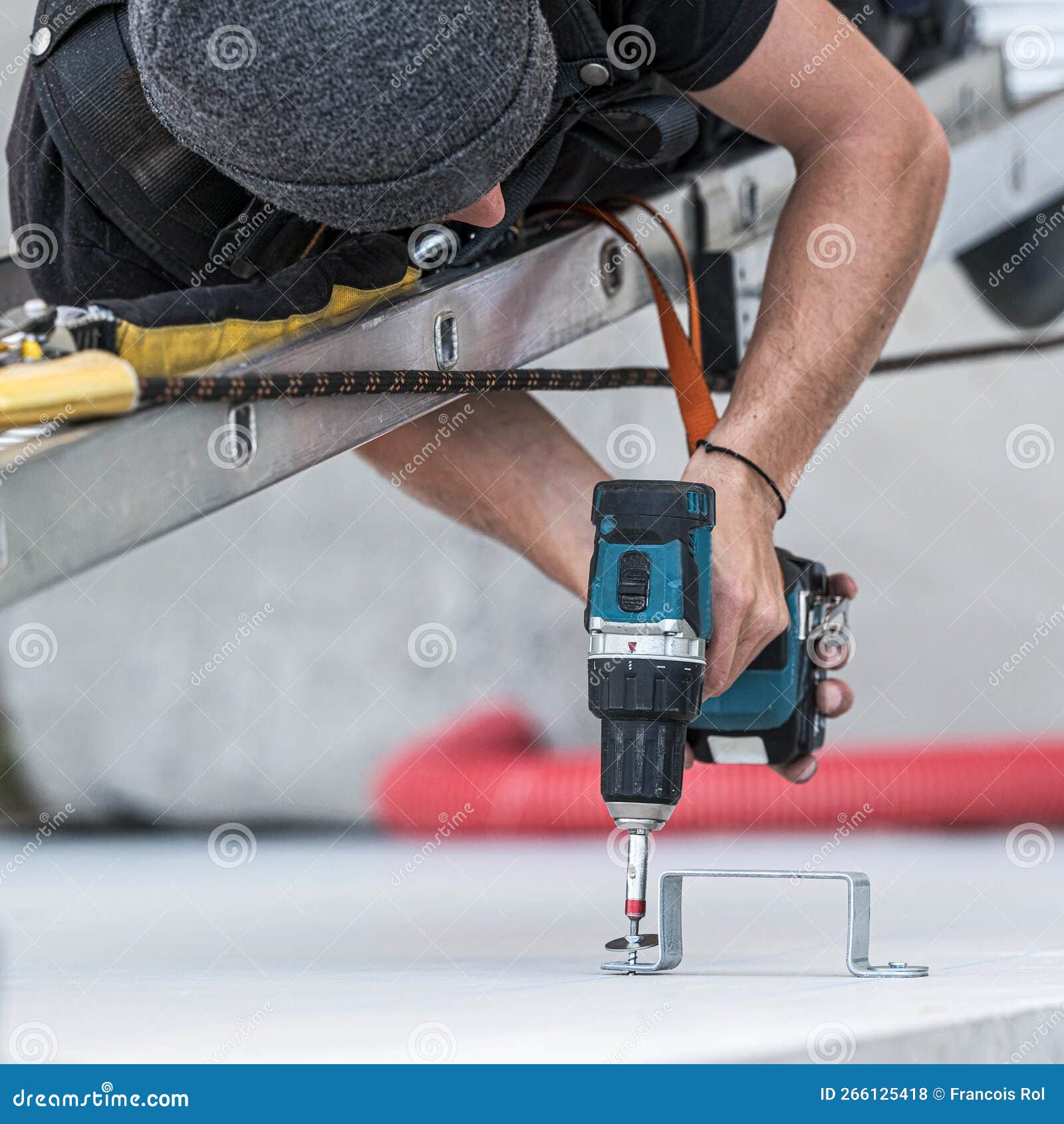 An Electrical Engineer of the Team Installs the Electrical Cables for ...