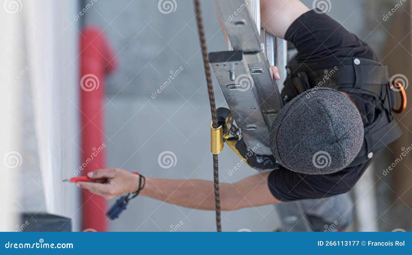 An Electrical Engineer of the Team Installs the Electrical Cables for ...
