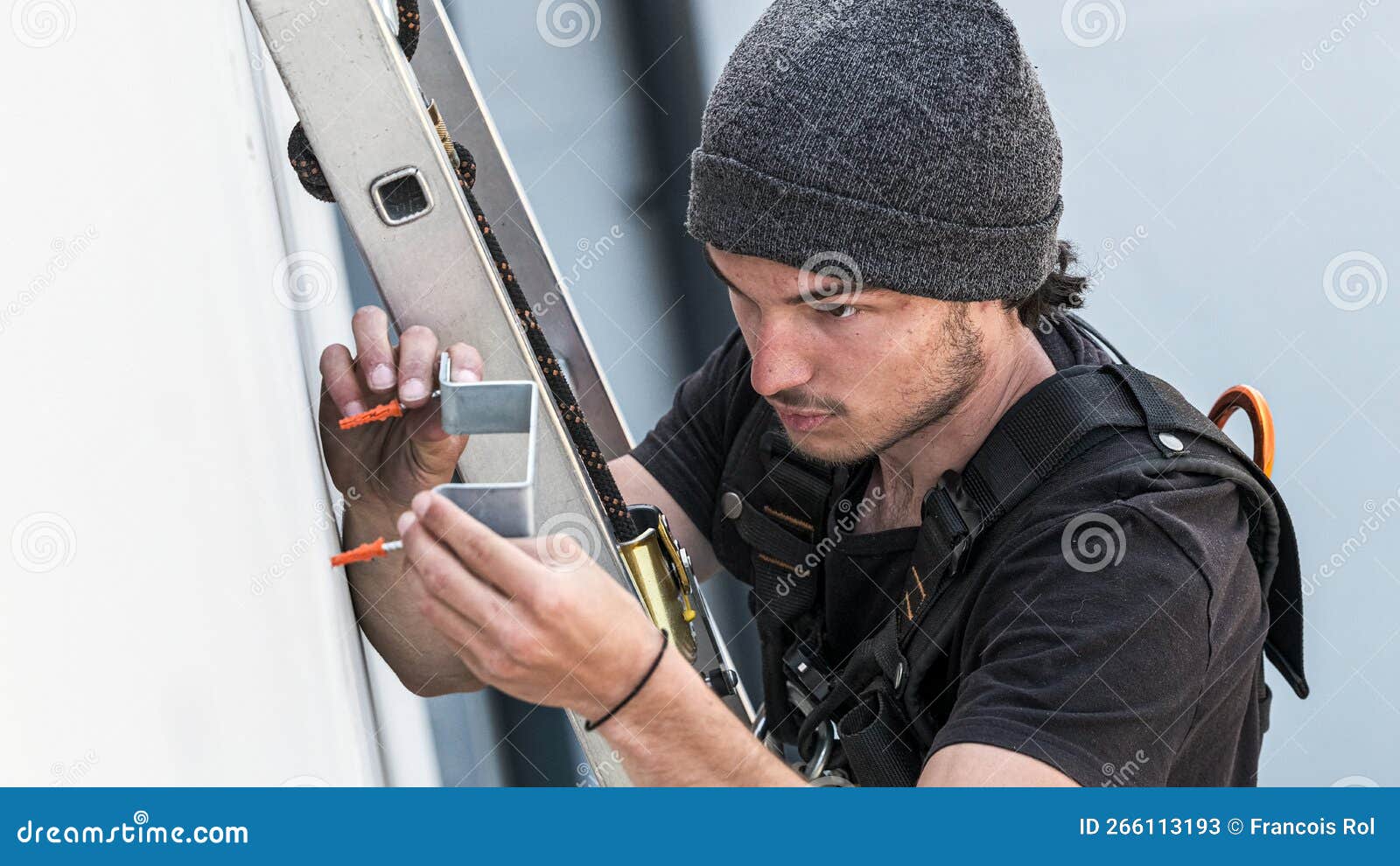 An Electrical Engineer of the Team Installs the Electrical Cables for ...