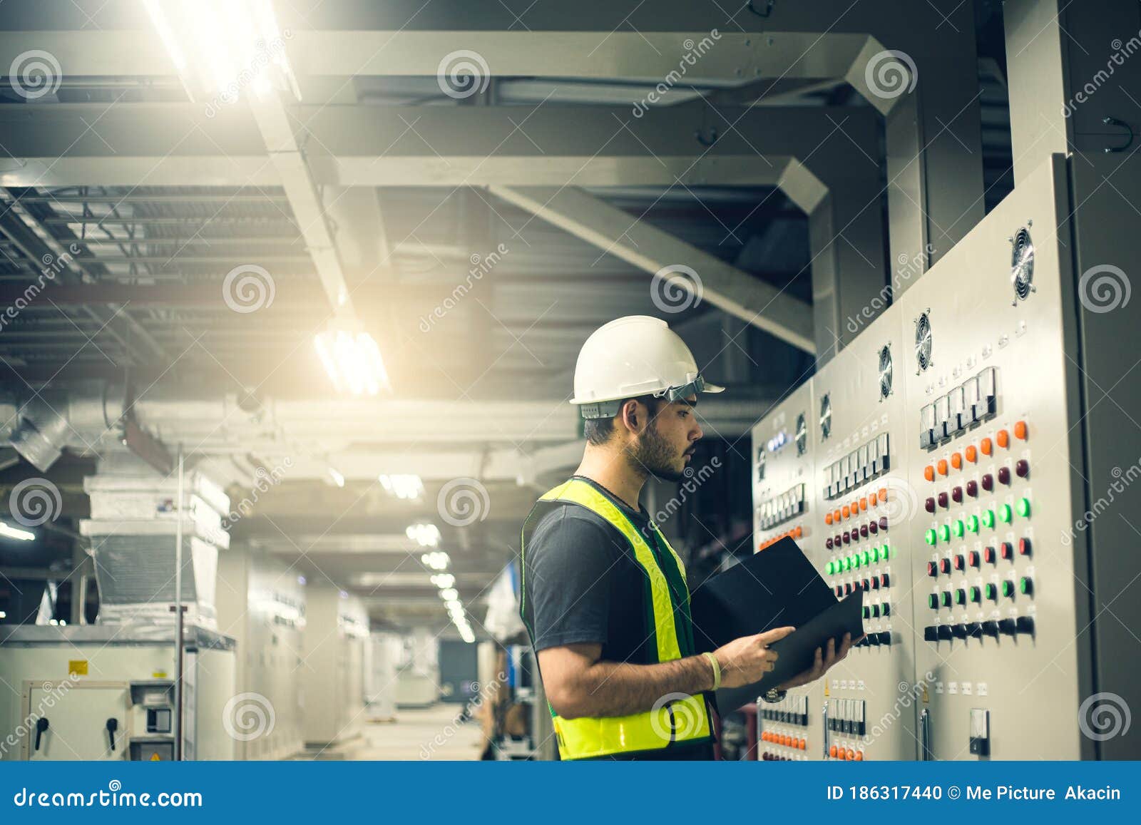 Electrical Engineer Team Working Front Control Panel. Stock Photo ...