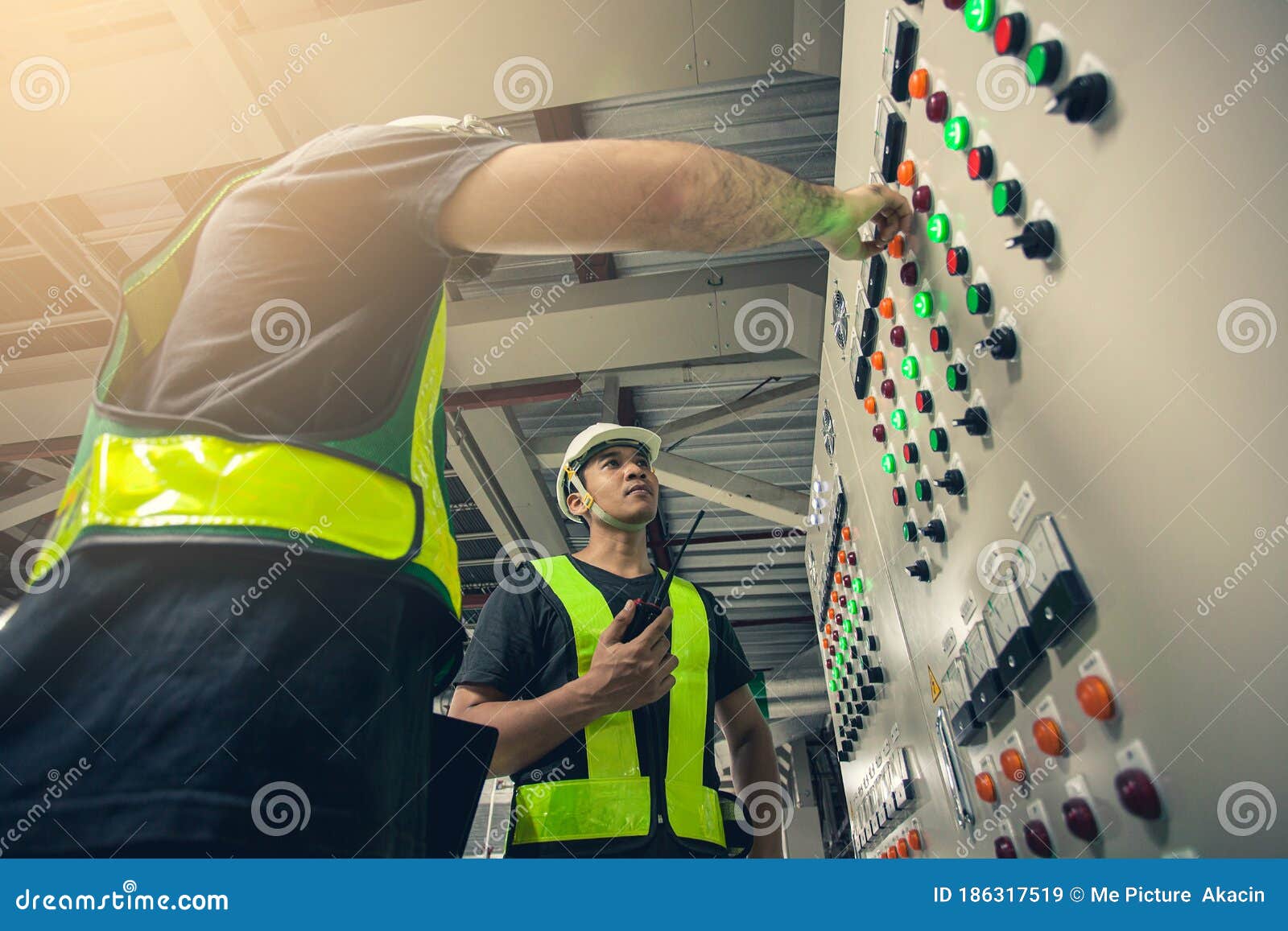 Electrical Engineer Team Working Front Control Panel. Stock Image ...