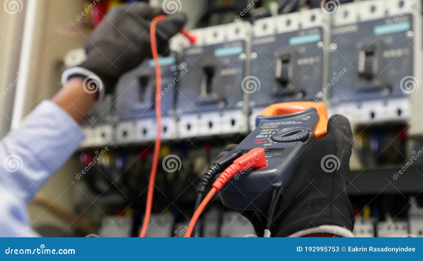 Electrical Engineer Using Digital Multi-meter Measuring Equipment To ...
