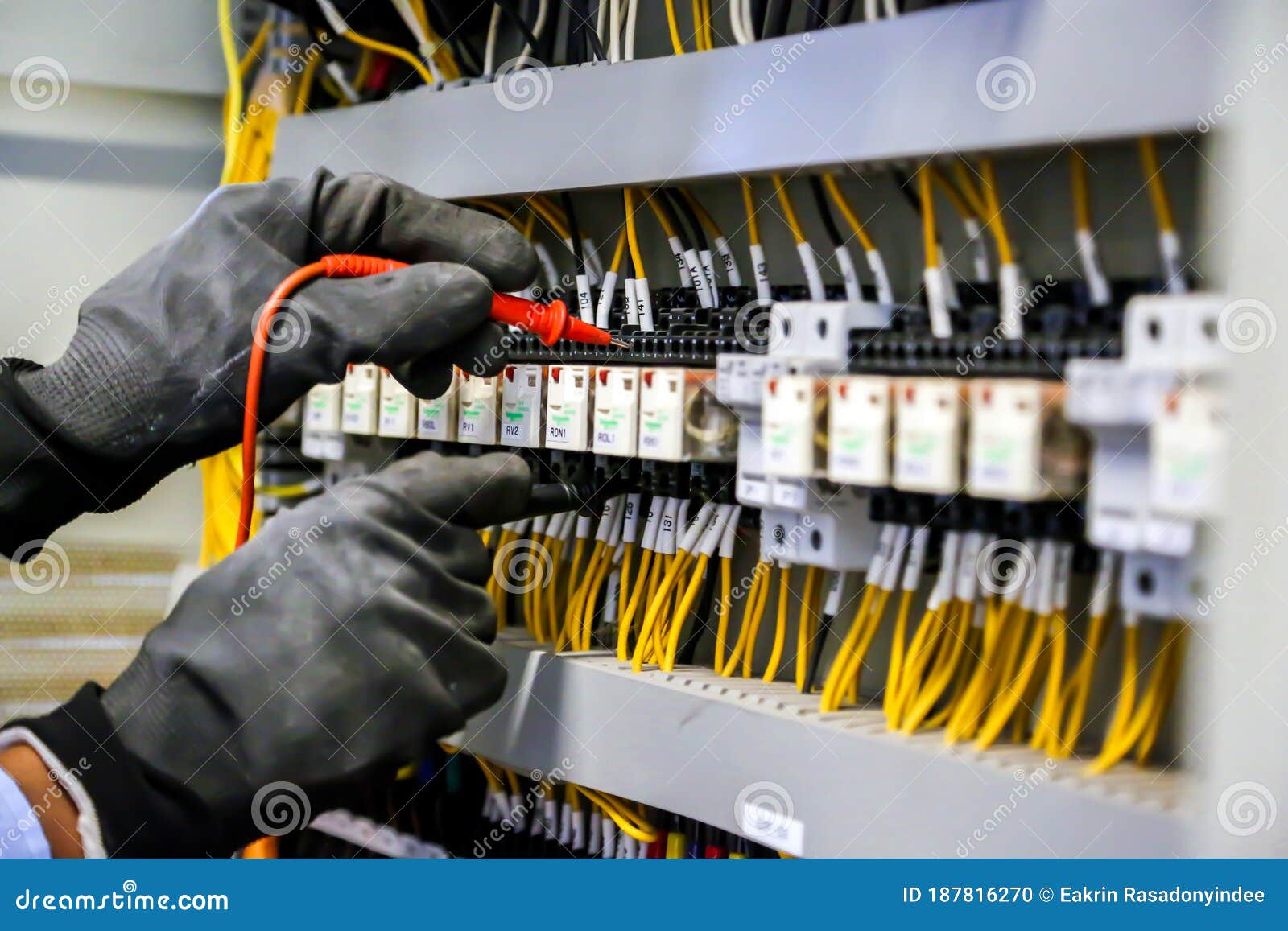 Electrical Engineer Using Digital Multi-meter Measuring Equipment To ...