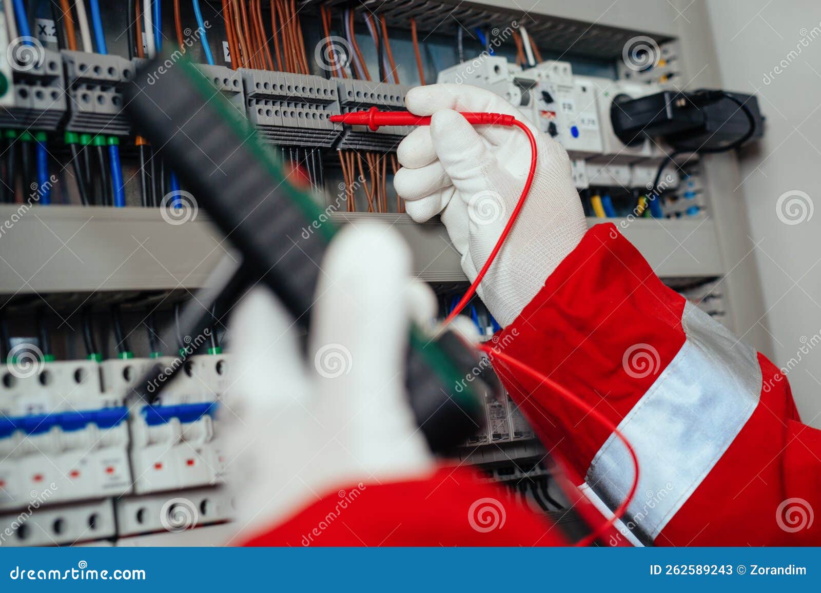Electrical Engineer Using Digital Multimeter Measuring Equipment To ...