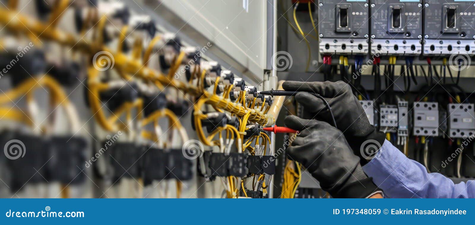 Electrical Engineer Using Measuring Equipment To Checking Electric ...