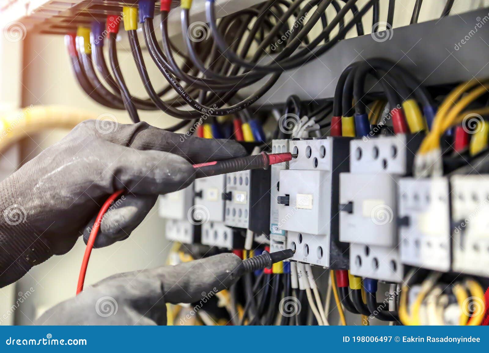 Electrical Engineer Using Measuring Equipment To Checking Electric ...