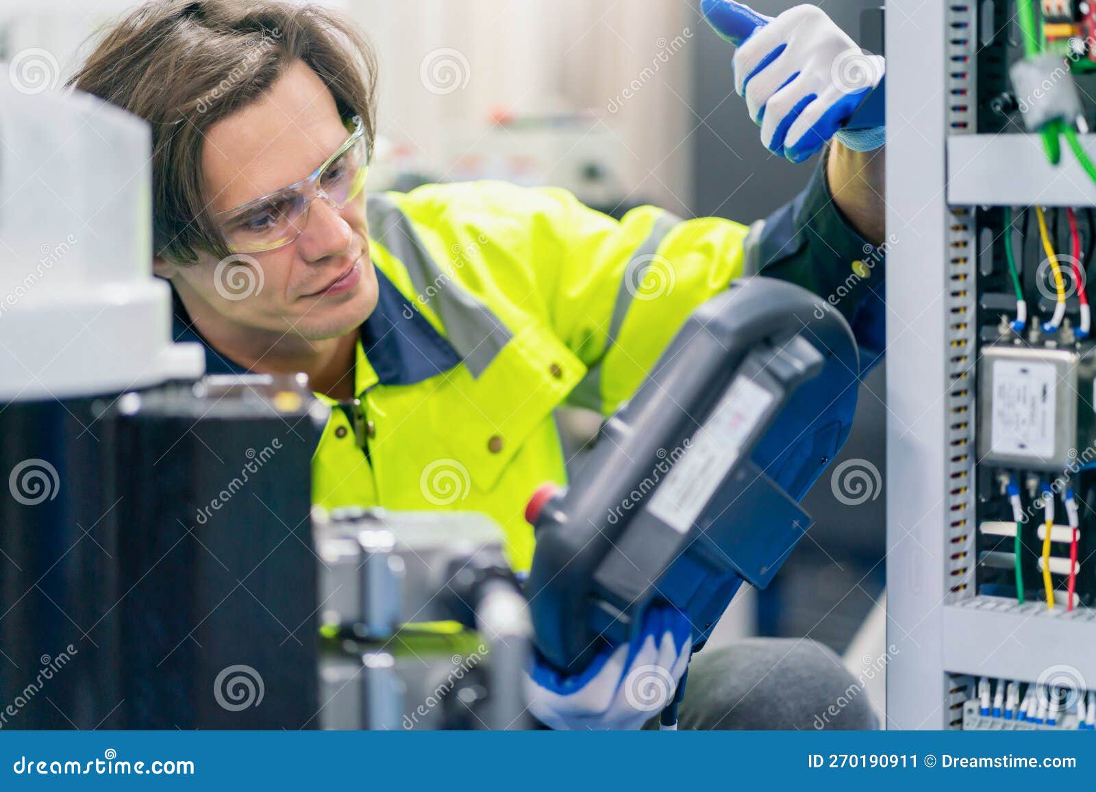 Electrical Engineer Work Tester Measuring Voltage and Current of Power ...