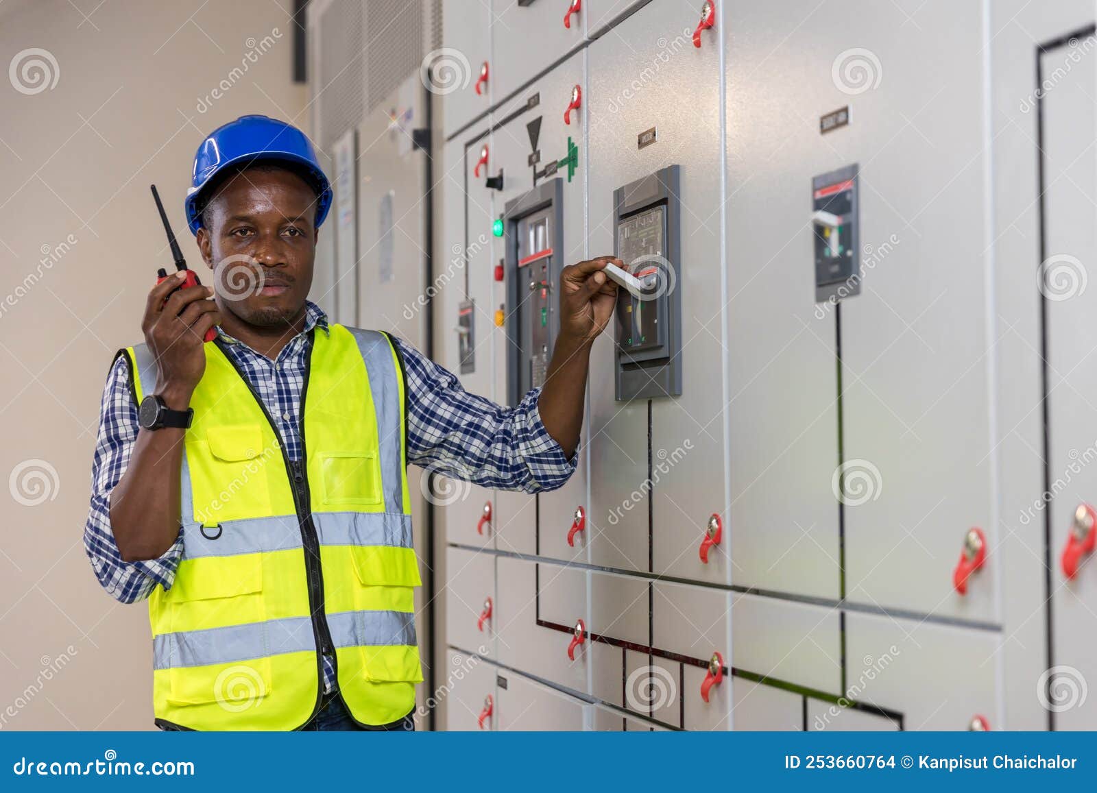Electrical Engineer Working in Control Room. Electrical Engineer Man ...