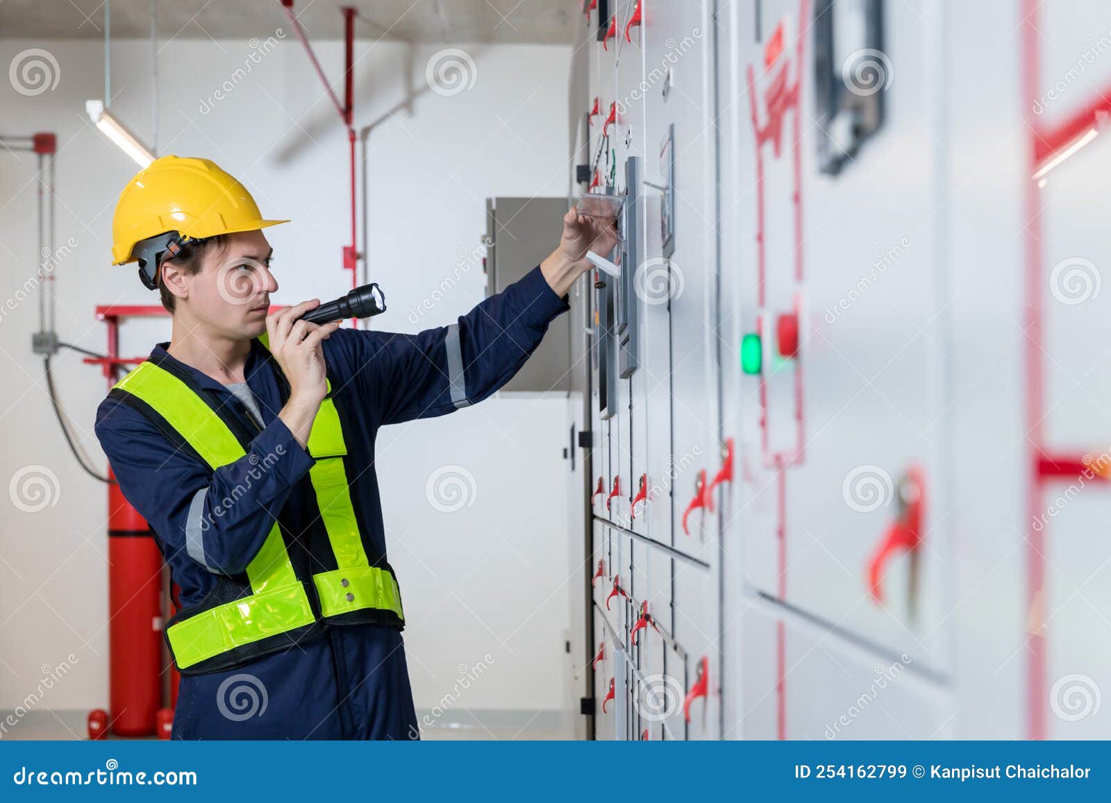 Electrical Engineer Working in Control Room. Electrical Engineer Man ...